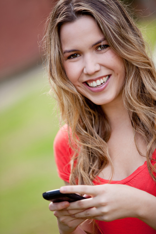 Woman texting on the phone – Generationology